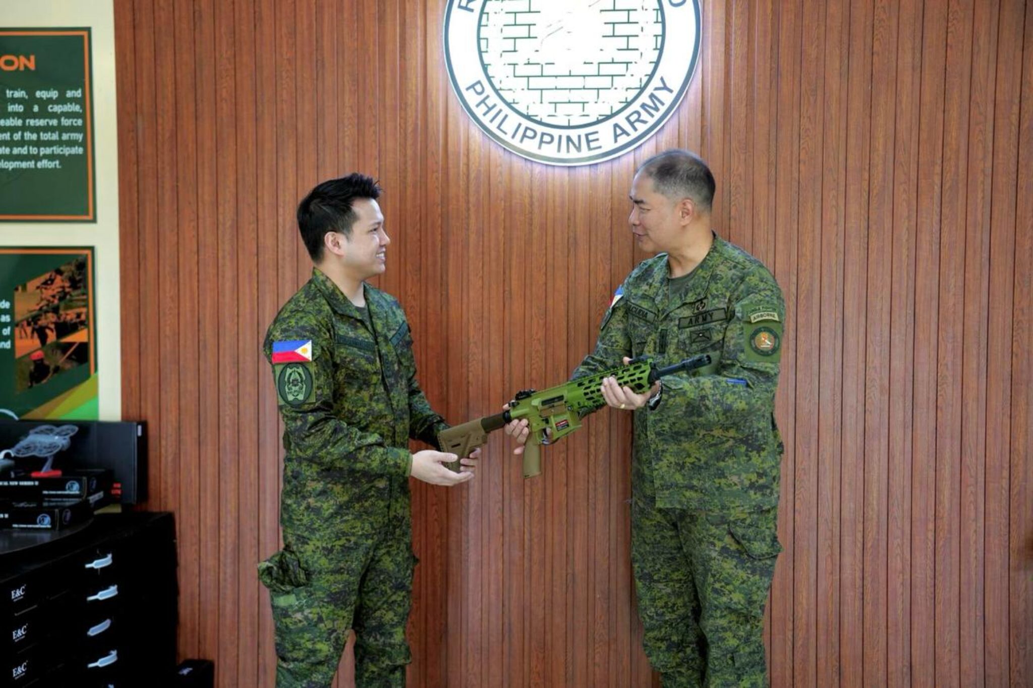 Brian Poe turns over training equipment to Army Reserves